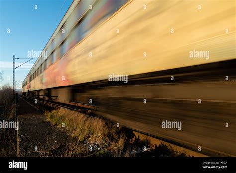 Train Passing With Motion Blur Railroad Travel Passenger Train During