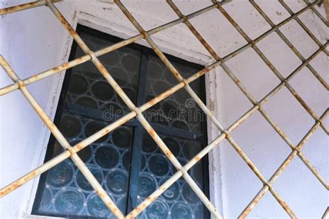 A Window With A Metal Grid On It Stock Image Image Of Structure