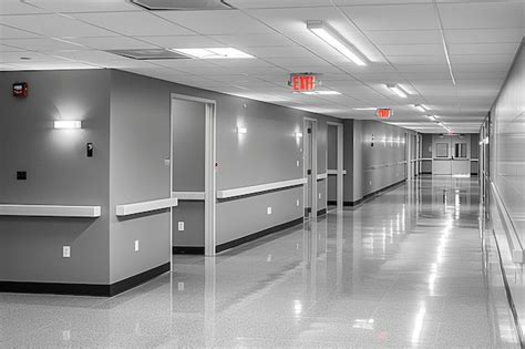 Empty Server Room With Minimalist Wall Mounted Emergency Exits