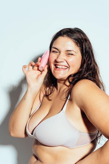 Premium Photo Plus Size Woman Posing In Studio In Lingerie