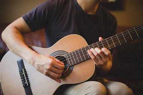 Playing Classical Guitar By Stocksy Contributor Lauren Lee Stocksy
