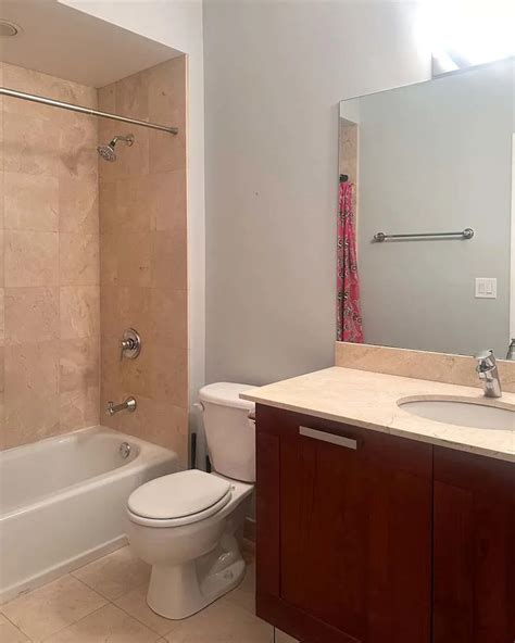 A Gorgeous Ikea Vanity Hack Transforms This Dated 2000s Bathroom