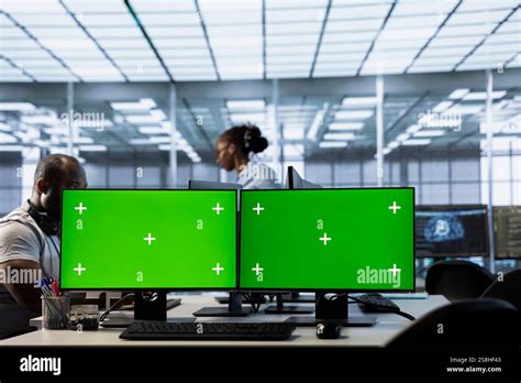 multi monitor isolated screen computer setup used by engineers working
