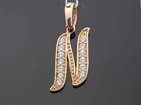 N Raidelė Auksinegulbelt