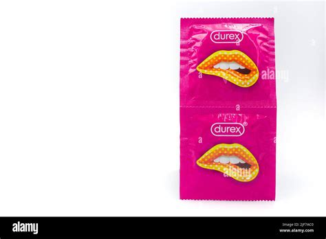 Pink Durex Condoms With Empty Space On White Example Of Contraceptives