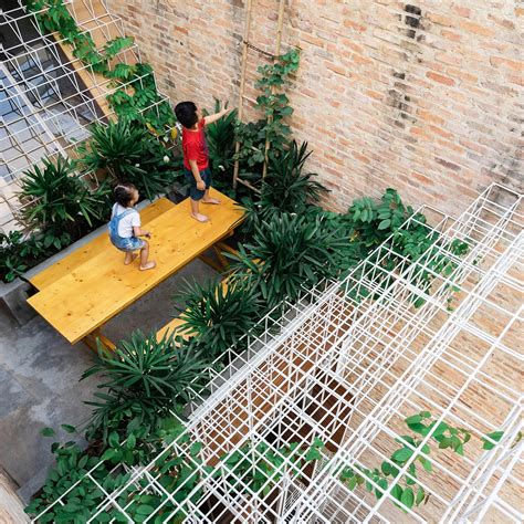 Block Architects Adds Trellises And Steel Bar Walls To Vietnamese House