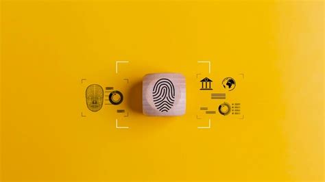 Premium Photo Fingerprint Scan Icon On Wood Cube Over Yellow Background Encryption And Access