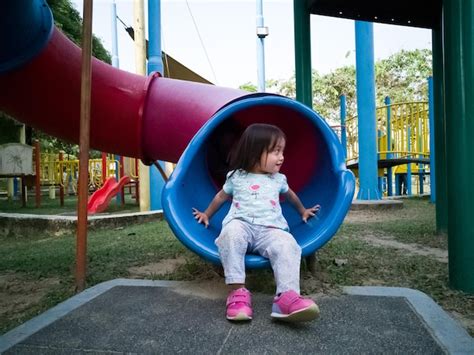 Premium Photo Cute Girl In Playground