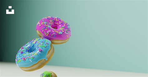 스프링클이 뿌려진 도넛 3개가 공중에 날고 있습니다 사진 Unsplash의 무료 디저트 이미지