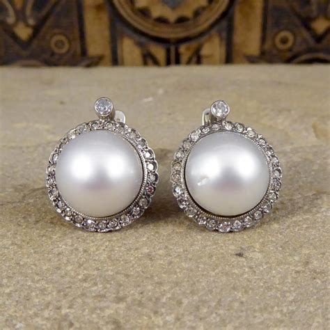Vintage Cultured Pearl Diamond Halo Omega Clip Earrings In 18 Carat
