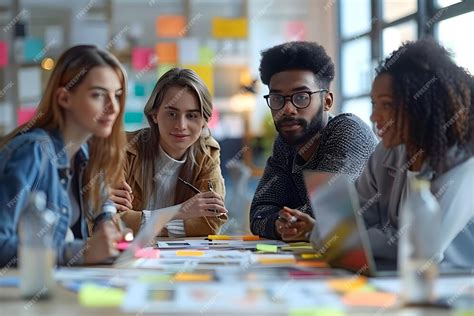 Collaborative Brainstorming Session Among Diverse Team Members Premium Ai Generated Image