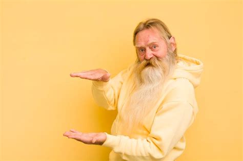 Premium Photo Holding An Object With Both Hands On Side Copy Space