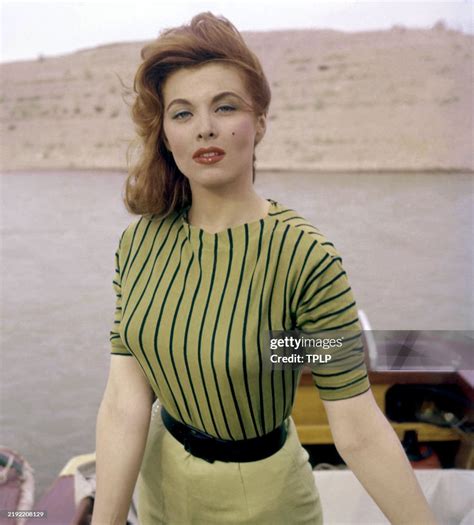 American Actress Tina Louise Poses For A Portrait Standing In A Boat