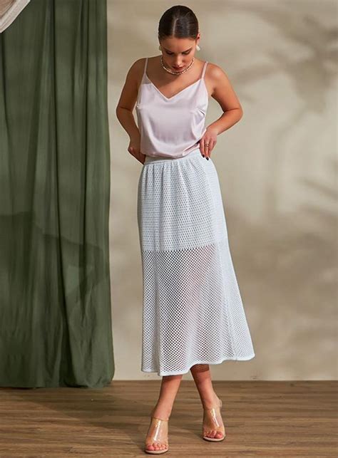 Спідниця літня ажурна міді молочного кольору модель 2515 Trikobakh