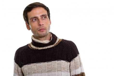 Premium Photo Young Handsome Man Thinking While Looking Up