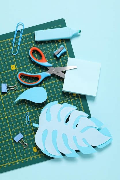 Premium Photo Patchwork Accessories Concept On A Turquoise Background Mat Cutting