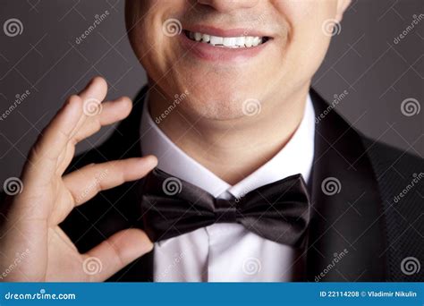 Man Straightening His Tux Stock Photo Image Of Face