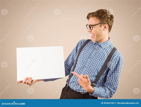 Nerd Pointing At Blank Card Against Cream Background Stock Image Image Of Holding Geek 89434103
