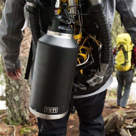 Yeti 64 Oz Rambler Bottle In Black Country Club Prep