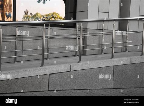Ramp With Metal Handrails Near Building Outdoors Stock Photo Alamy