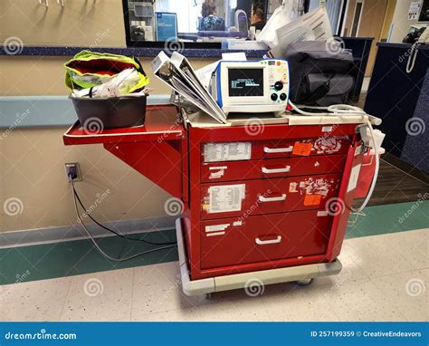 Red Icu Crash Cart With Defibrillator In Hallway Stock Image Image Of Heart Defibrillator