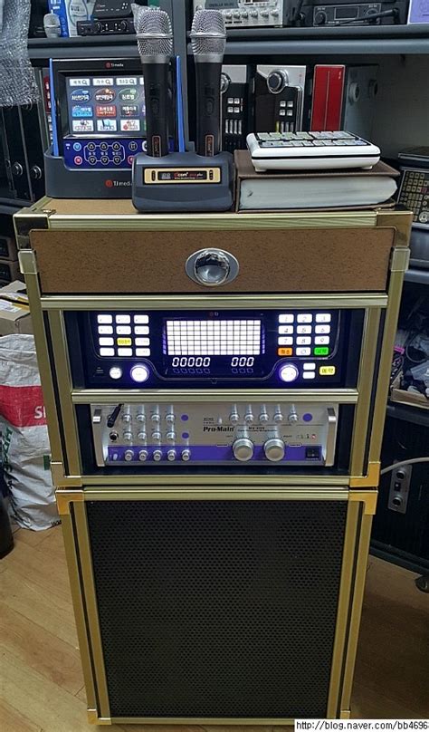 이동식노래방기계 태진 최고급 S60f 반주기로 작업한 20인치 Led Tv 2채널 앰프와 무선마이크 스피커내장 이동형 노래방기기
