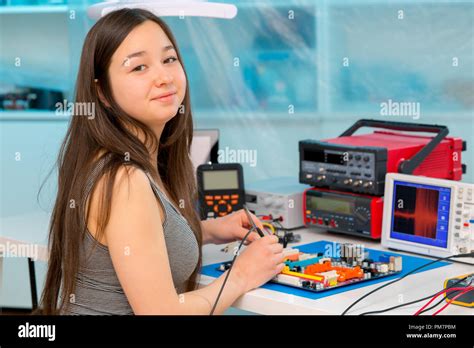 Girl In Robotics Laboratory Stock Photo Alamy