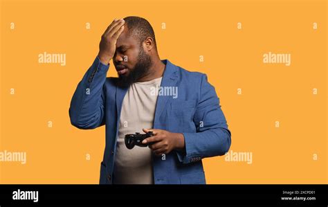 Gamer Annoyed After Losing Online Multiplayer Videogame Being Defeated By Rivals Man Doing