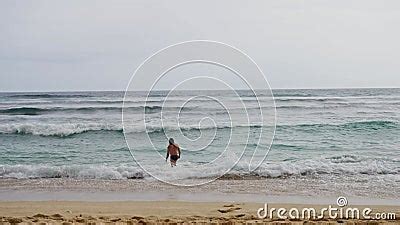 A Beautiful Landscape A Deserted Beach Far Away A Naked Man