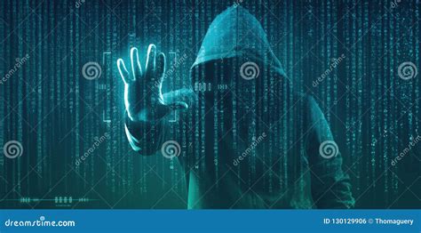 Hooded Hacker With Mask Typing On Virtual Keyboard Stock Image