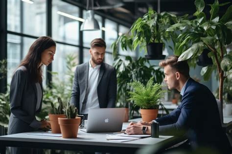 Premium Photo Interns Collaborating In A Modern Office Space