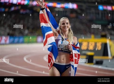 Keely Hodgkinson Celebrating Her Medal With Her Countrys Flag In The