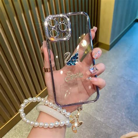 قاب موبایل فانتزی مدل قو محافظ لنزدار الماسی Iphone 13pro الماس کاور