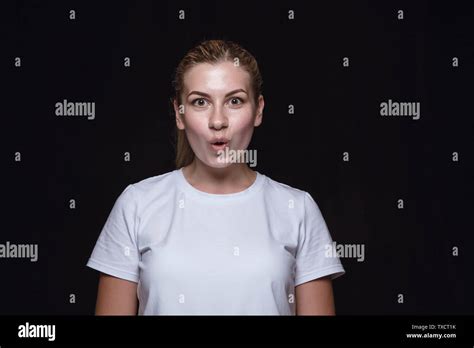 Close Up Portrait Of Young Woman Isolated On Black Studio Background