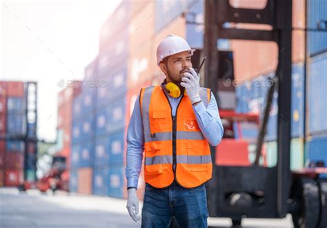 Supervisor Dock Cargo Checking And Control Loading Containers Box At Container Yard Warehouse