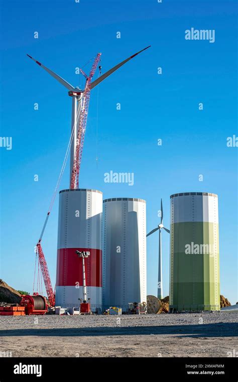 Assembly Of A Wind Turbine The Last Rotor Blade Is Being Mounted