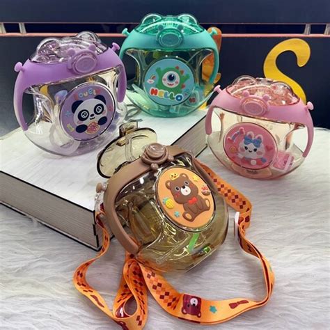 خرید و قیمت قمقمه دوناتی اسپری دار چراغ دار دسته دار دارای بند بلند از