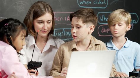 Boy Using Laptop Programing Engineering Code And Writing Program