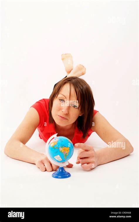 Woman With Globe Stock Photo Alamy