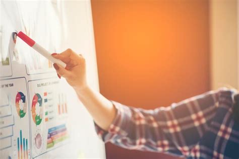 Premium Photo Midsection Of Businessman Working Over Graph At Office