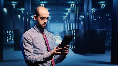 Data Center It Engineer Standing In Server Room Stock Image Image Of Center Information