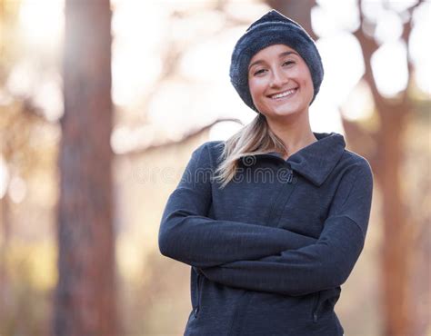 Portrait Arms Crossed And Smile Of Woman Hiking Outdoors For Health