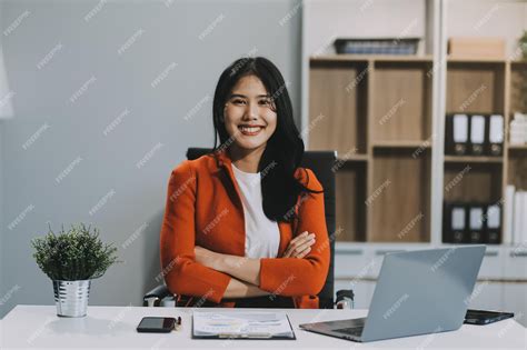 Premium Photo Secretary Concept Female Secretary Sitting On Her Desk And Working With