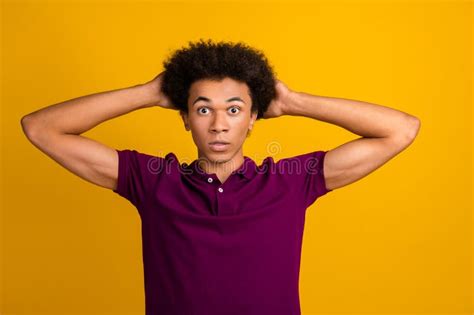 Photo Of Anxious Embarrassed Man Wear Violet Trendy Clothes Hold Arms Behind Head Isolated On
