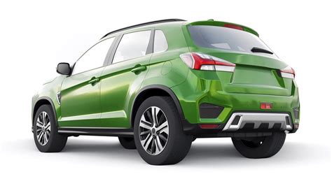 디자인 3d 렌더링을 위한 빈 몸체가 있는 흰색 균일한 배경의 녹색 소형 도시 Suv 프리미엄 사진