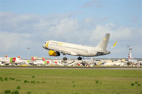 Vueling Airbus A320 Taking Off At Lisbon Airport Editorial Stock Image