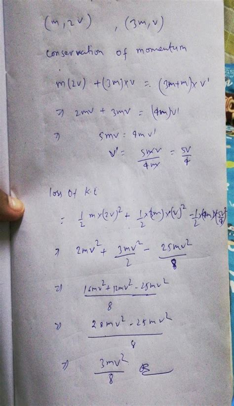 a particle of mass m moving with with velocity 2v collides with