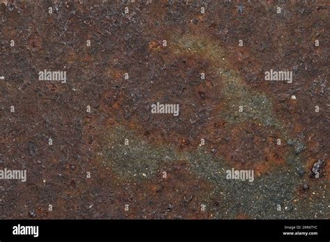 Iron Oxide Rust Solid Full Frame Background Image Rusted Texture Of A Metal Manhole Cover With