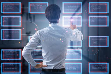 Back View Of Businessman Hand Pointing At Abstract Creative Coding