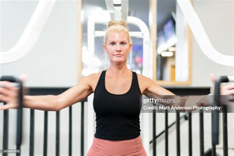 Woman Working Out With A Pec Deck Chest Pectoralis Major Press Machine Horizontal Aspect High